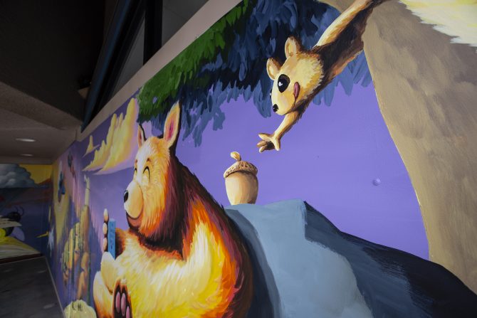 Joe Pagac’s mural at Kirk-Bear Canyon is a colorful ode to libraries ...